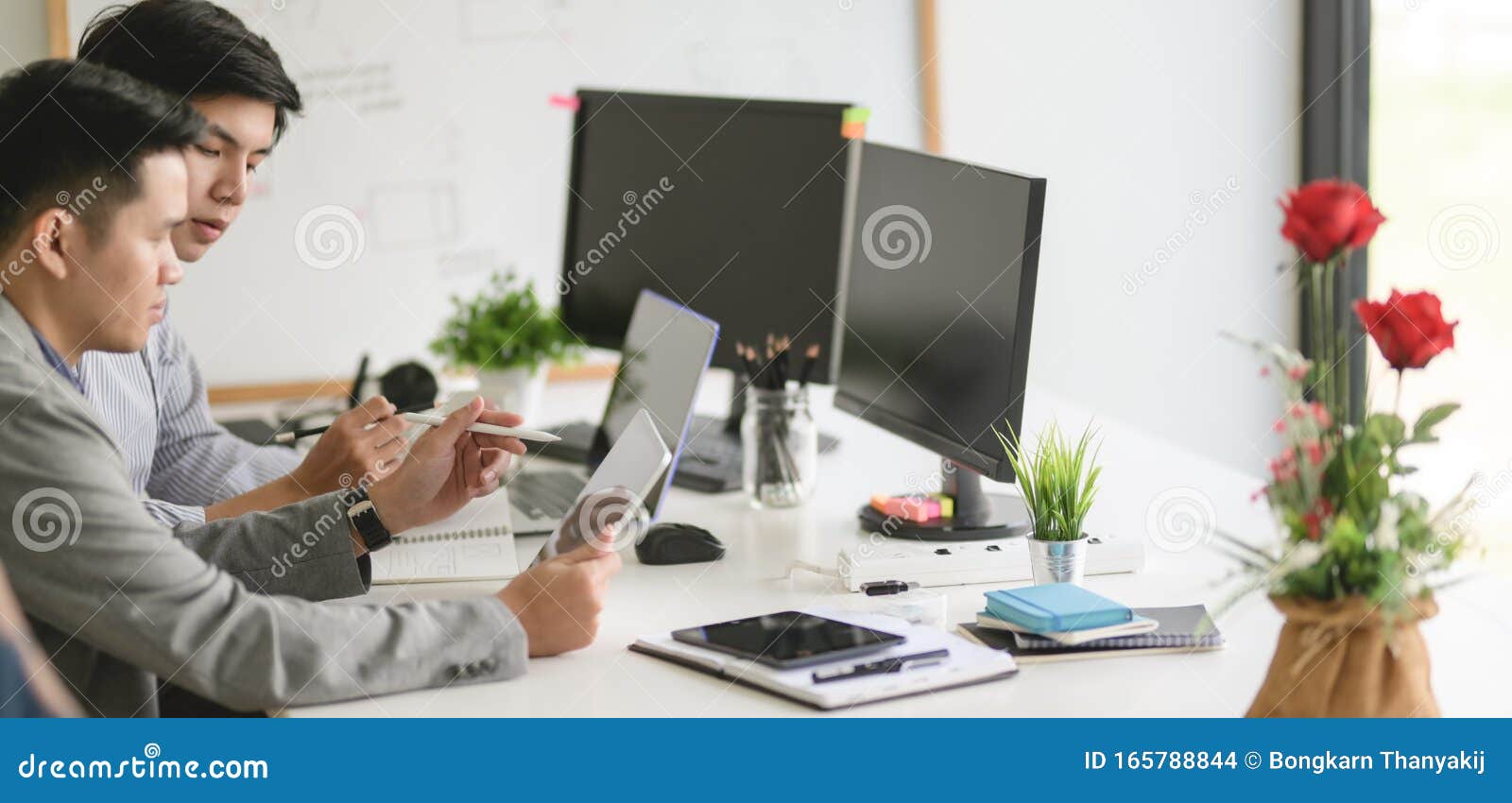 Young Professional UX Web Developer Team Working on Their Smartphone ...