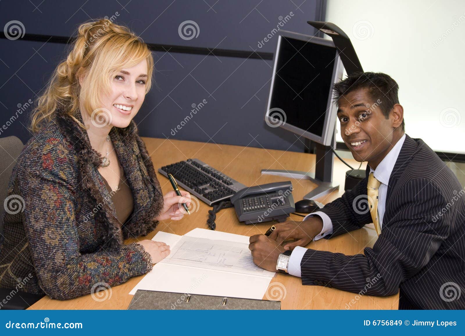 Young Professionals Signing a Contract Stock Image - Image of confident ...