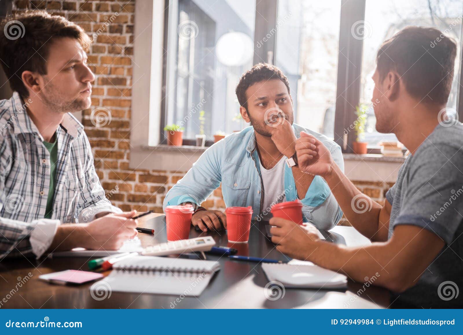 Young Professionals Working on Business Project Together Stock Photo ...