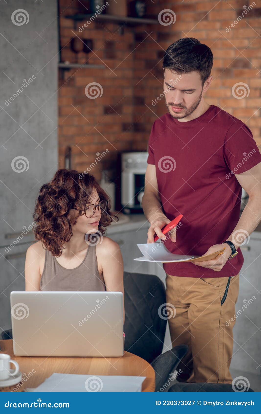 Young Professionals Working Together and Looking Interested Stock Image ...