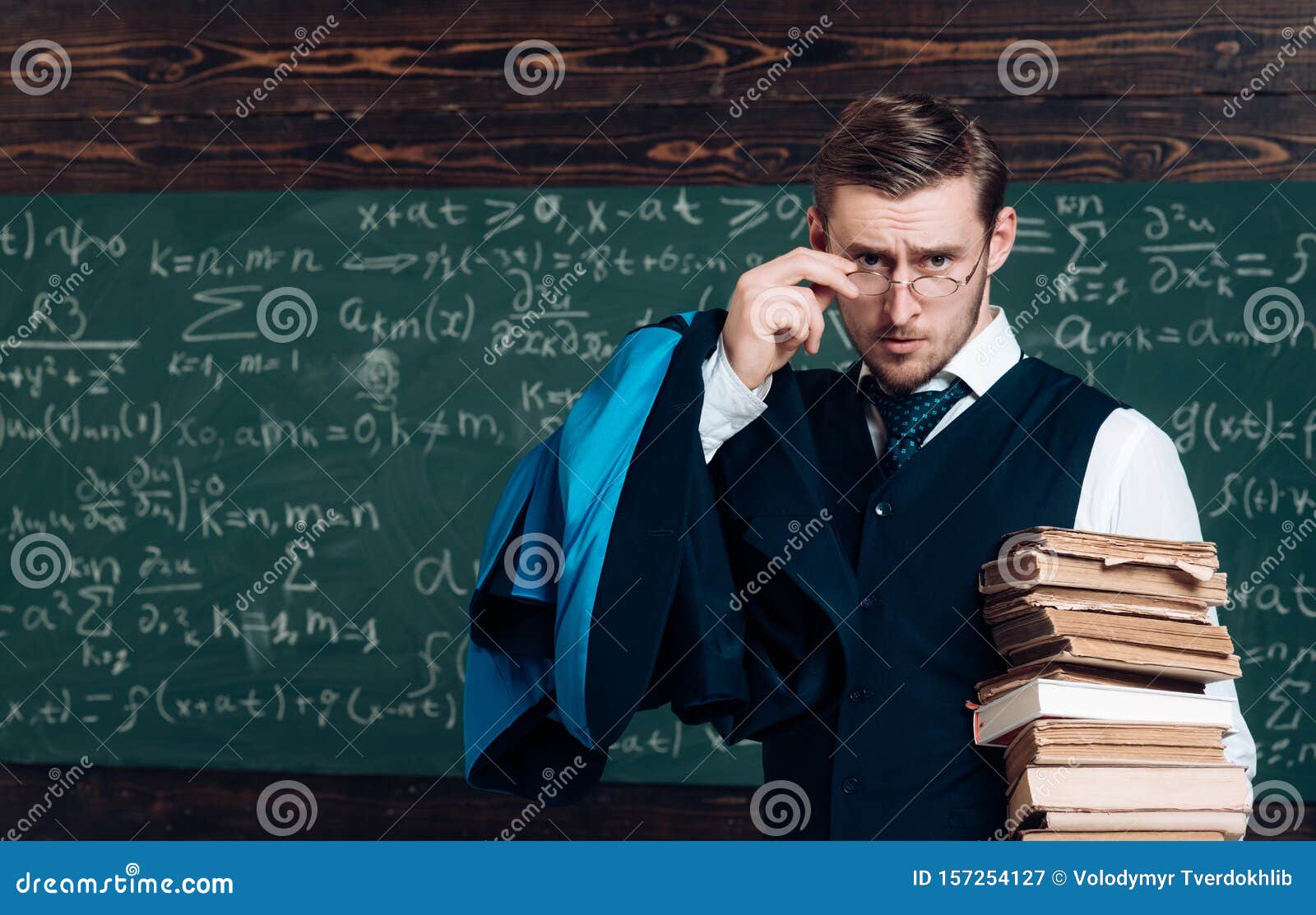 Young Professor Teacher Speaking With The Microphone In The Lecture ... Young Professor Teacher Speaking With The Microphone In The Lecture ...