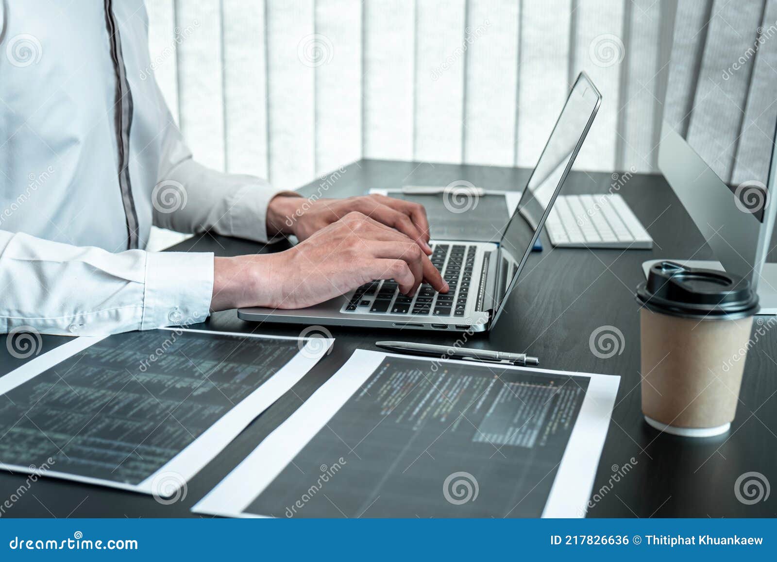 Young Programmer Working in Software Javascript Computer in it Office, Writing Codes and Data ...
