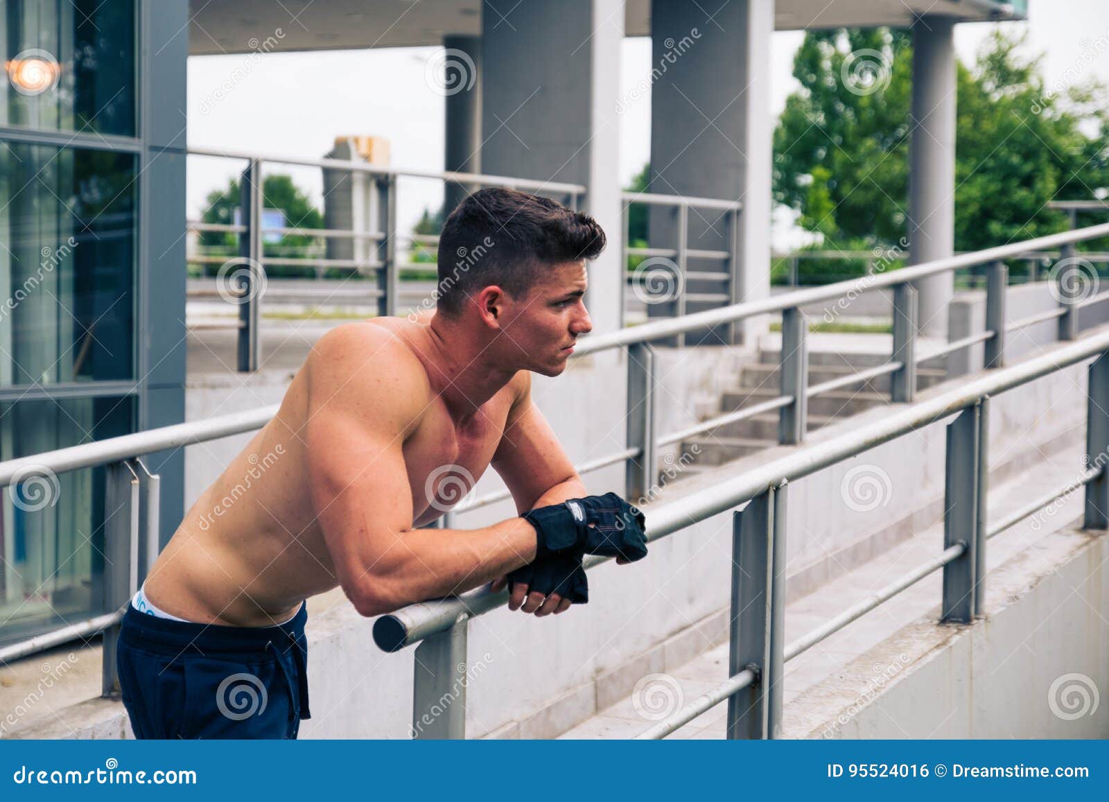 Young Proud Man Relaxing after a Very Hard Workout. Selective Focus ...