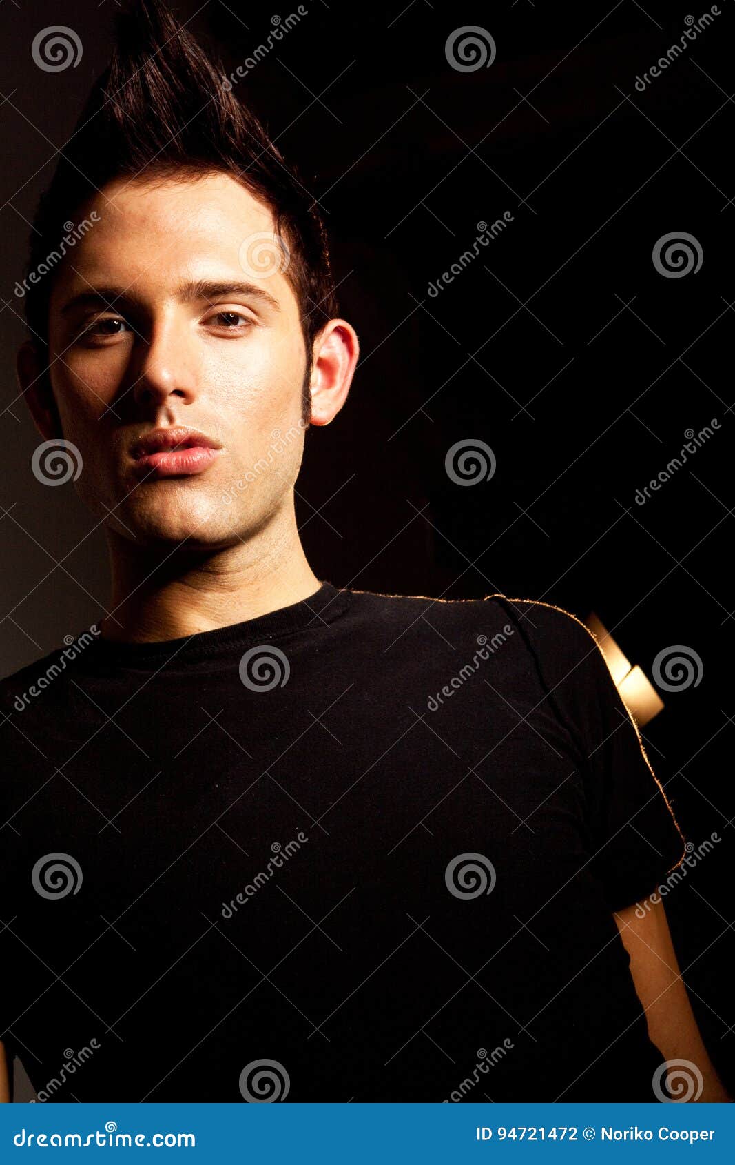 Young Punk Rocker Staring and Looking Mean. Stock Photo - Image of ...