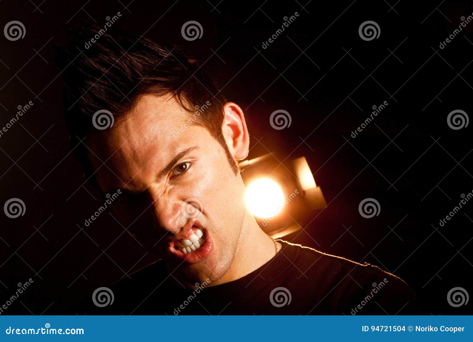 Young Punk Rocker Staring and Looking Mean. Stock Photo - Image of ...