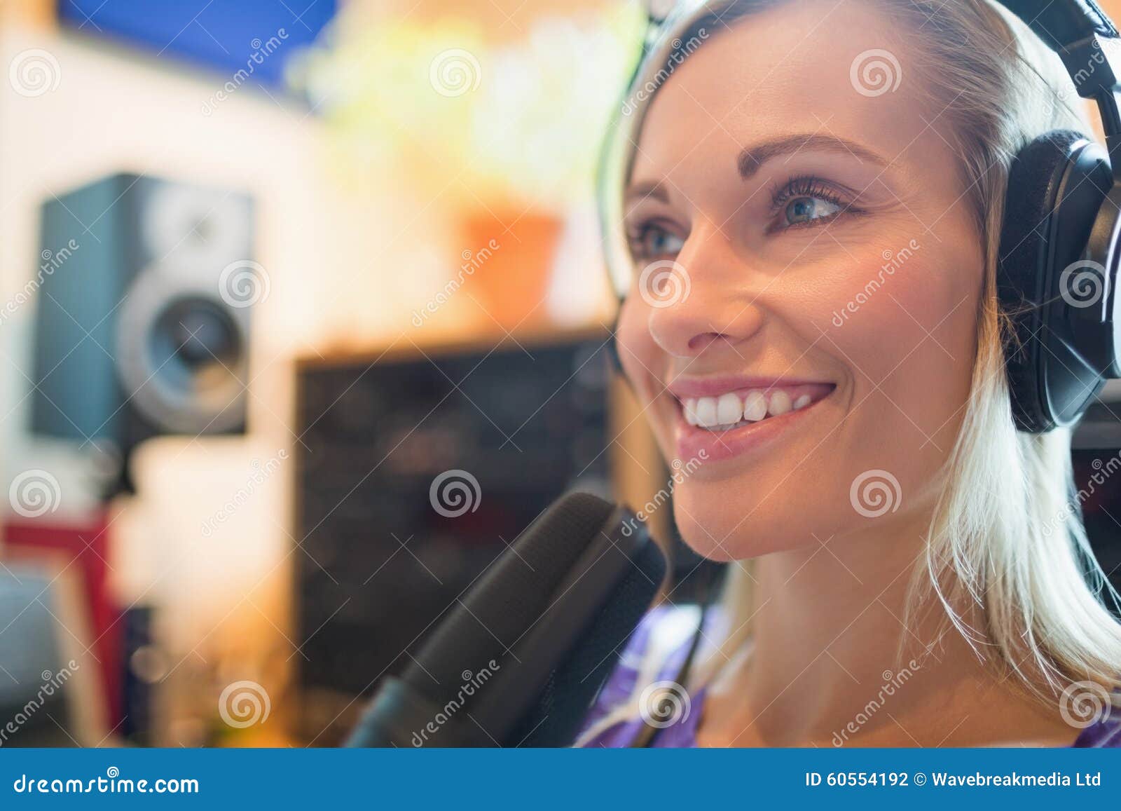 Young Radio Host Wearing Headphones Using Microphone Studio Stock ...