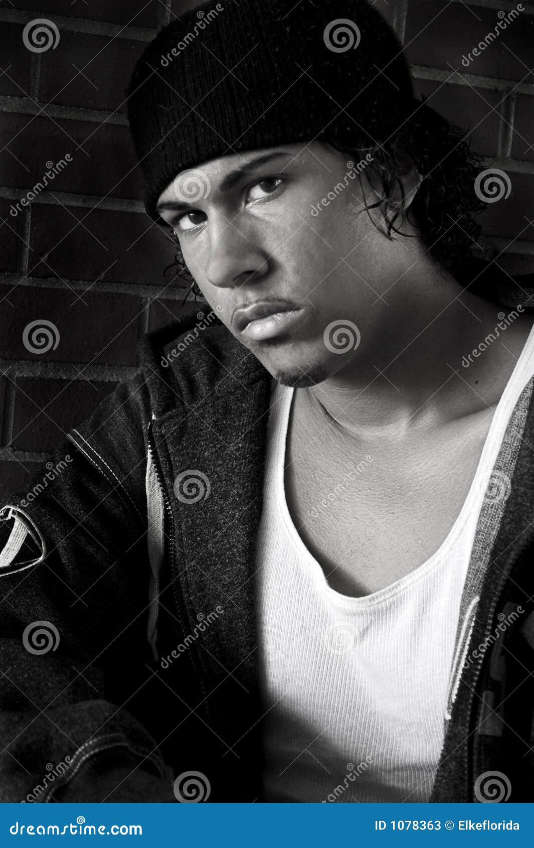Young rapper stock image. Image of goatee, wall, hair - 1078363