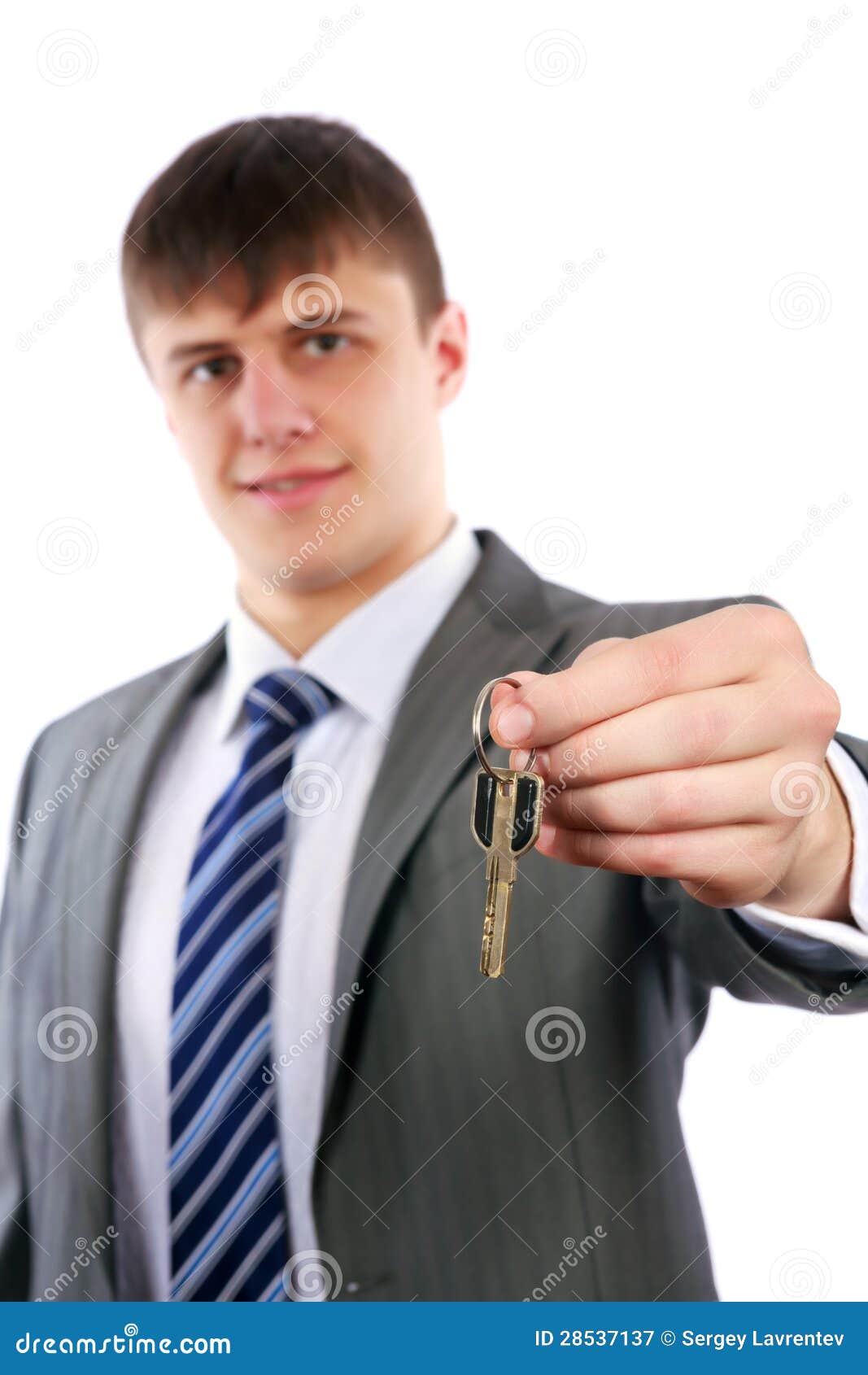 Young realtor handing keys stock image. Image of hand - 28537137