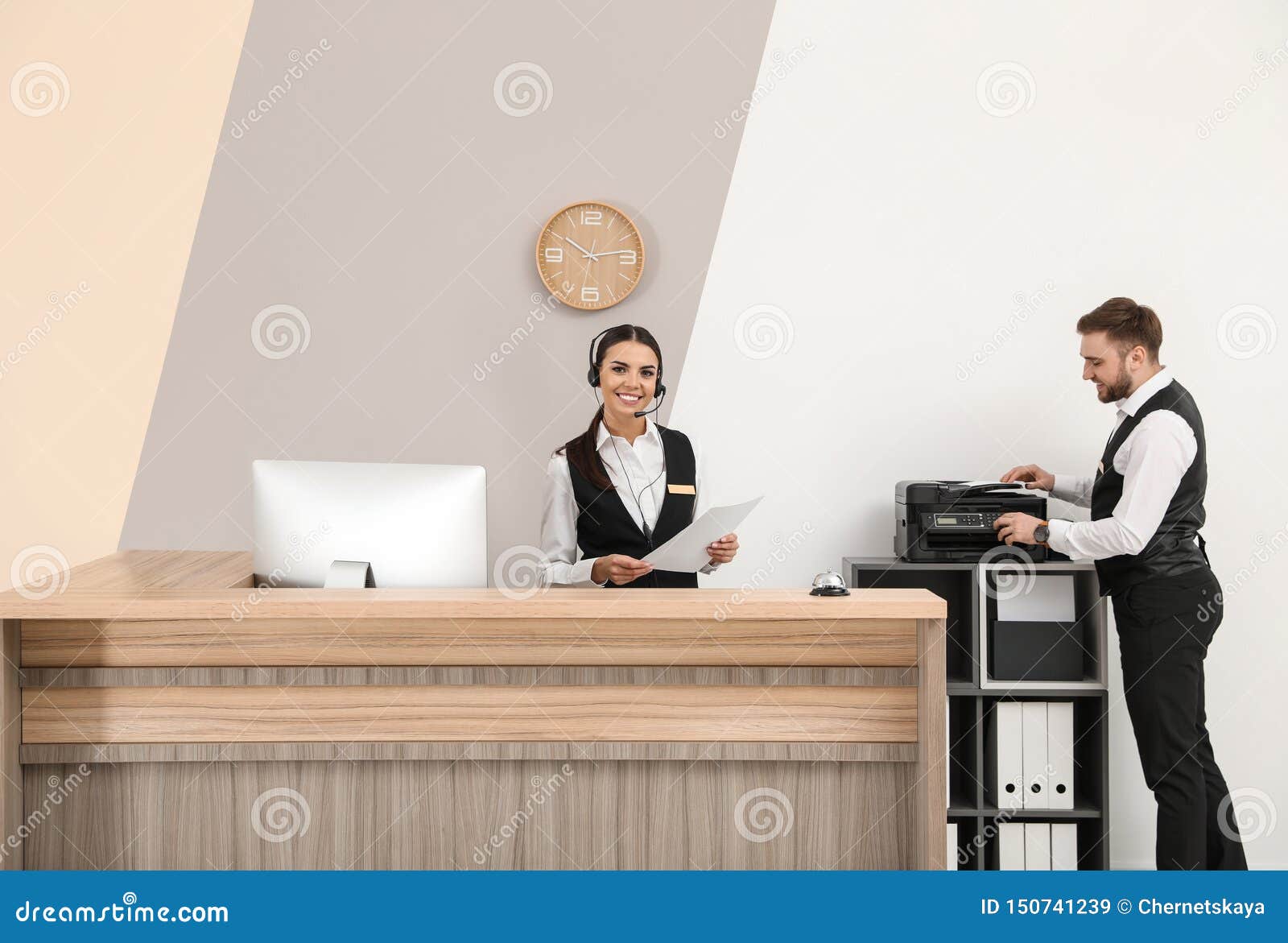 Young Receptionists in Professional Uniform Stock Image - Image of ...