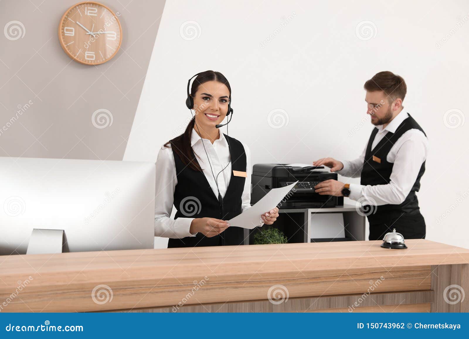 Young Receptionists in Professional Uniform Stock Photo - Image of ...