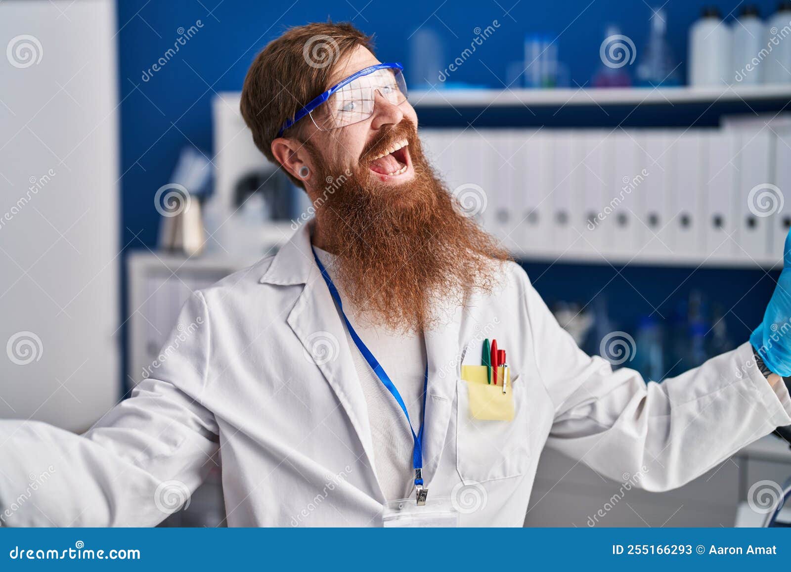 Young Redhead Man Scientist Smiling Confident Speaking at Laboratory ...