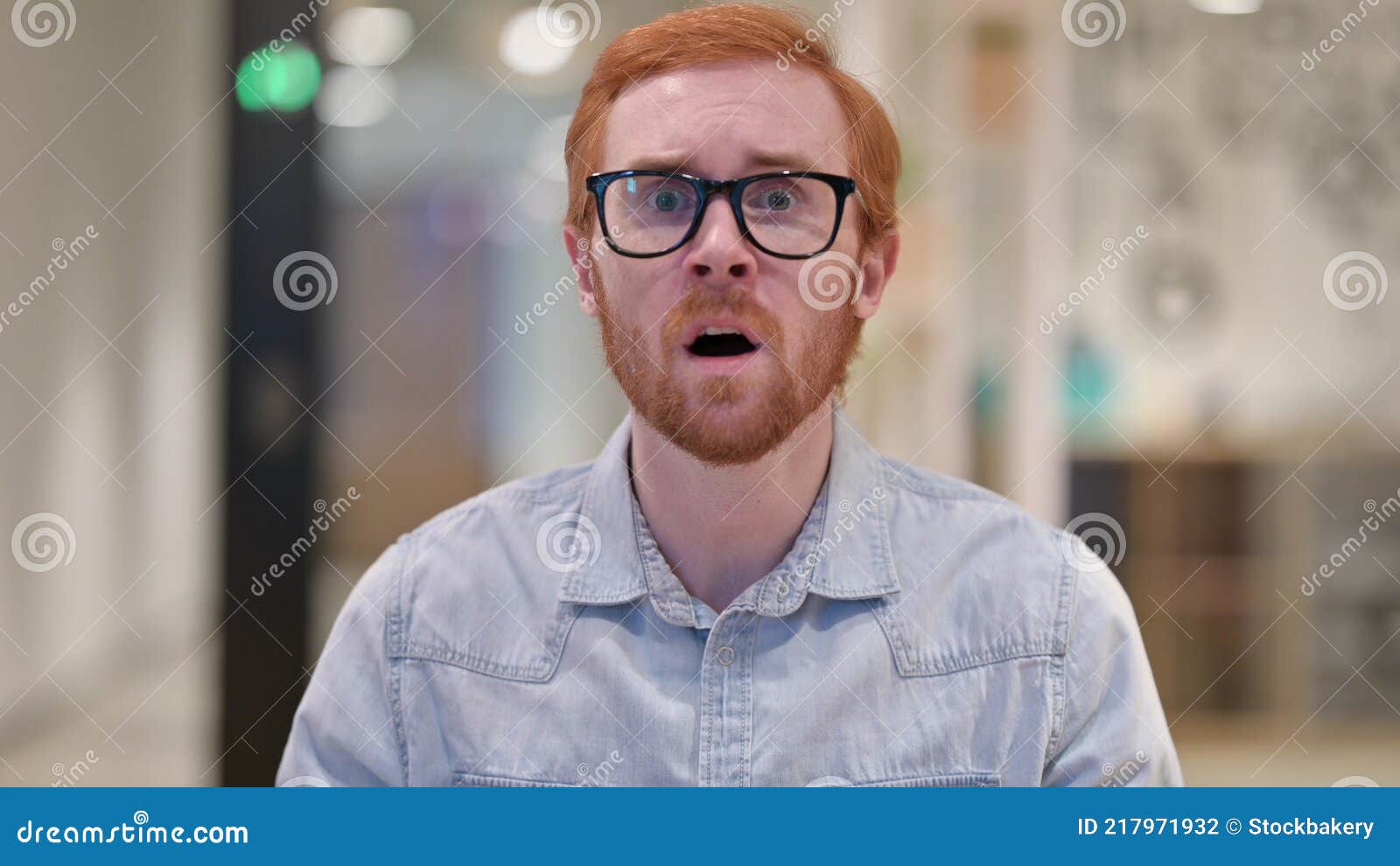 Young Redhead Man Shocked by Loss, Failure Stock Photo - Image of ...