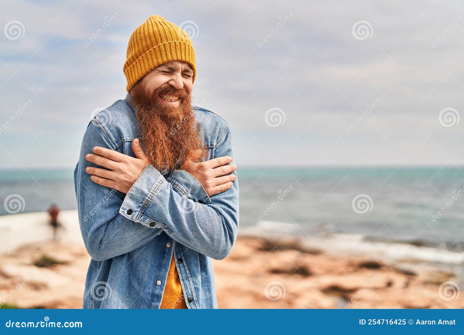 Young Redhead Man Suffering for Cold at Seaside Stock Image - Image of ...