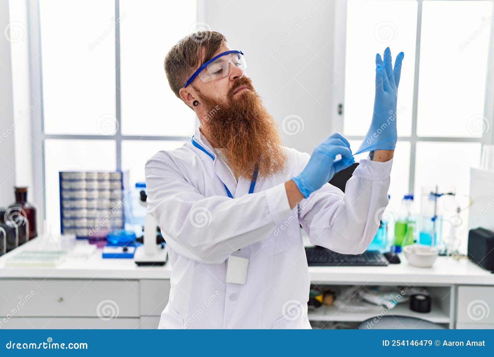 Young Redhead Man Wearing Scientist Uniform Wearing Gloves at ...