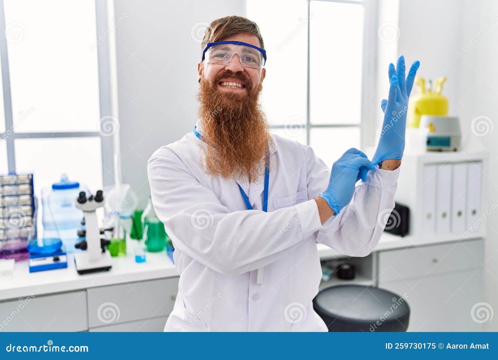 Young Redhead Man Wearing Scientist Uniform Wearing Gloves at ...