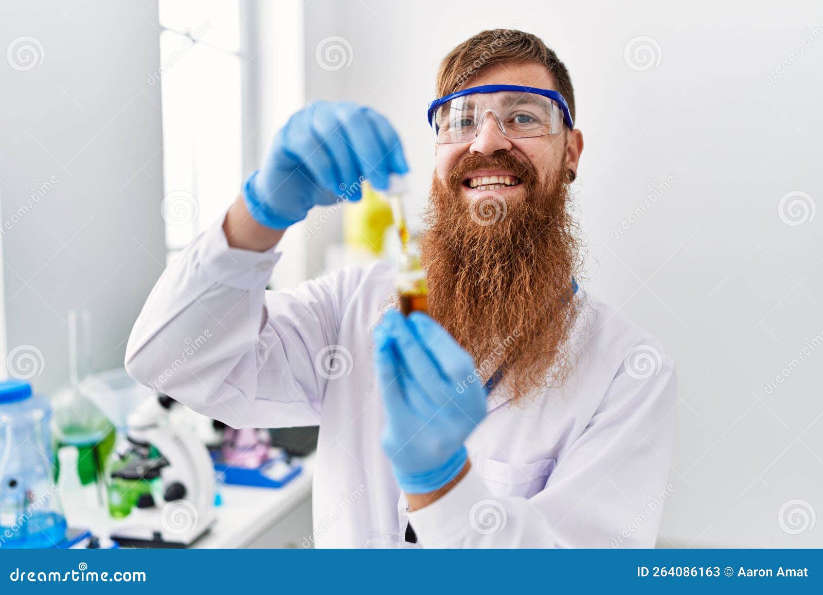 Young Redhead Man Wearing Scientist Uniform Holding Reactive at ...