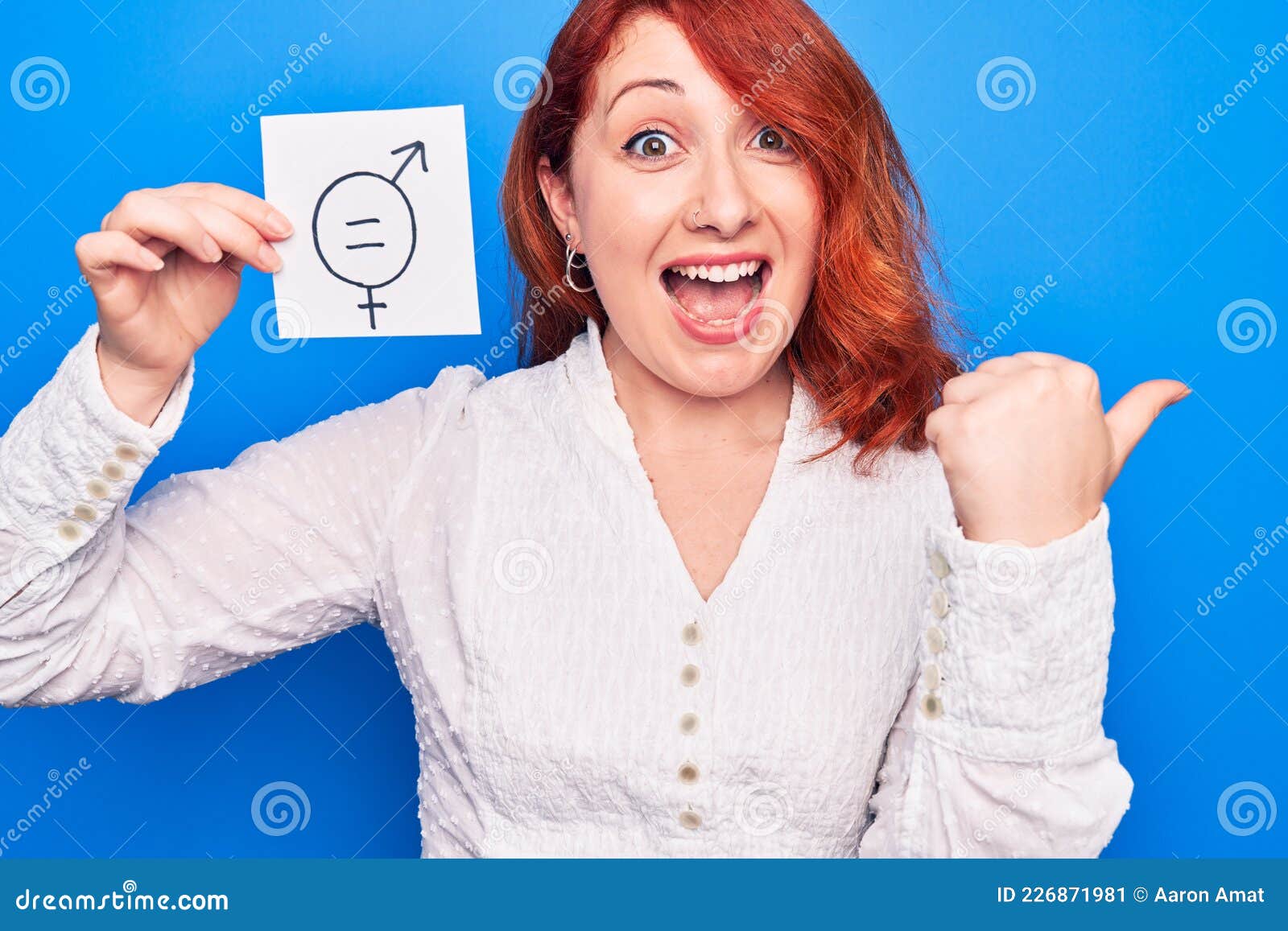 Young Redhead Woman Asking For Sex Discrimination Holding Paper With
