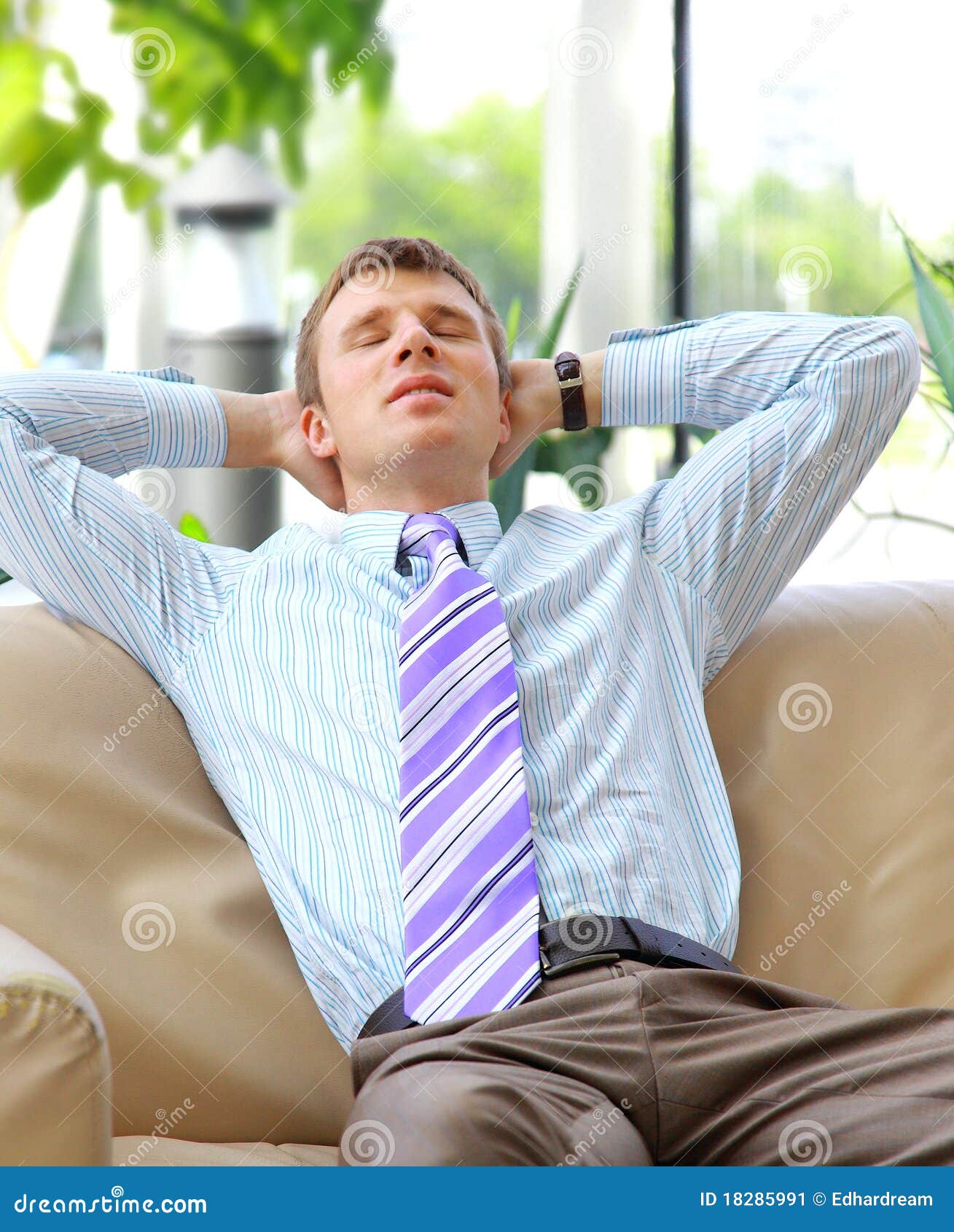Young relaxed business man stock image. Image of hands - 18285991
