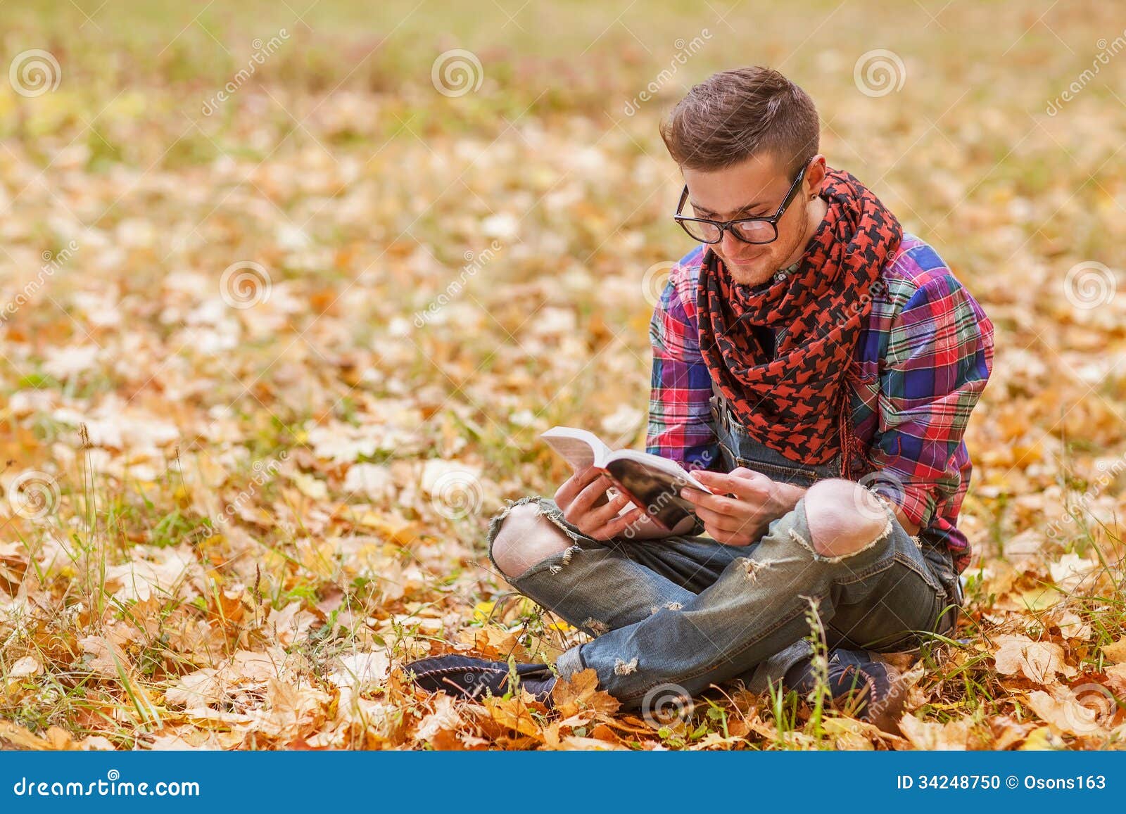 Young Relaxed Man Reading Book in Nature, Back on Tree, Meadow B Stock ...
