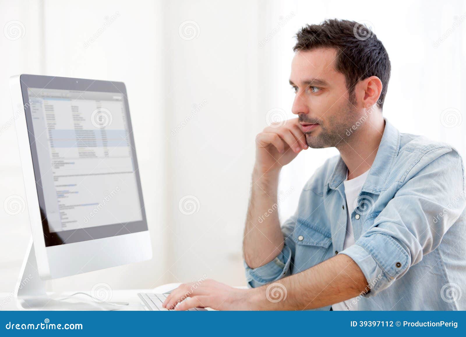 Young Relaxed Man Using Computer Stock Photo - Image of leisure, house ...