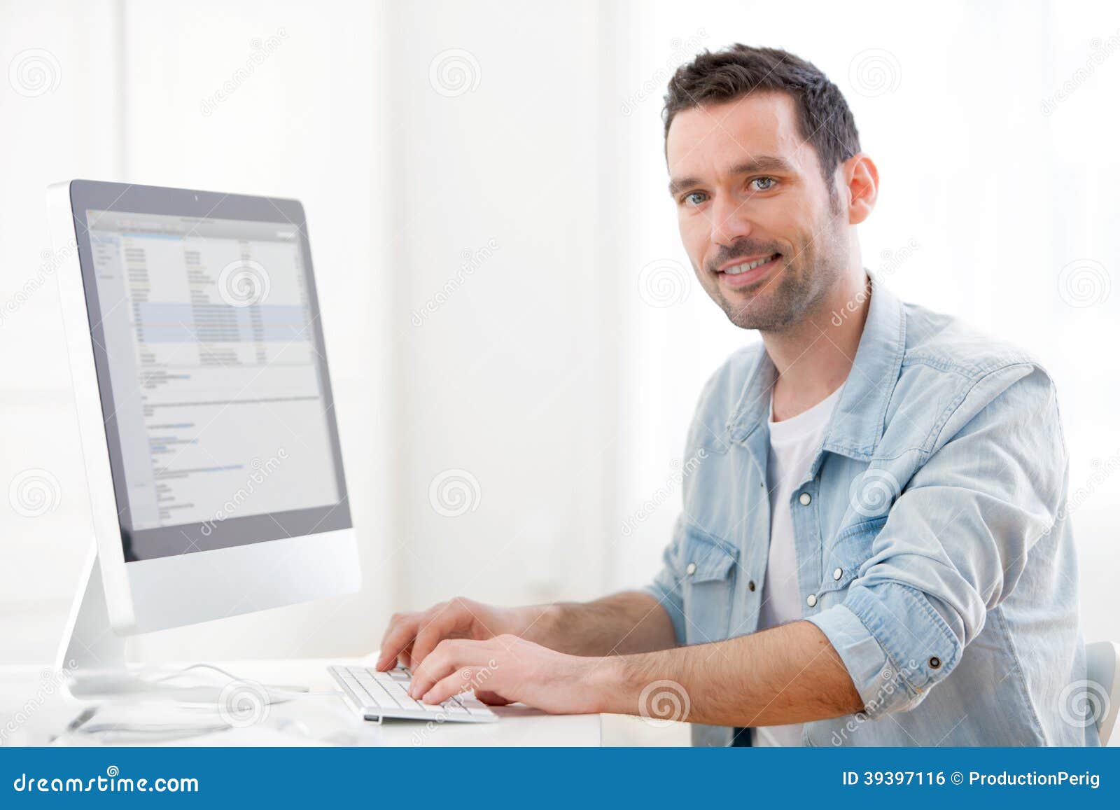 Young Relaxed Man Using Computer Stock Photo - Image of desktop ...