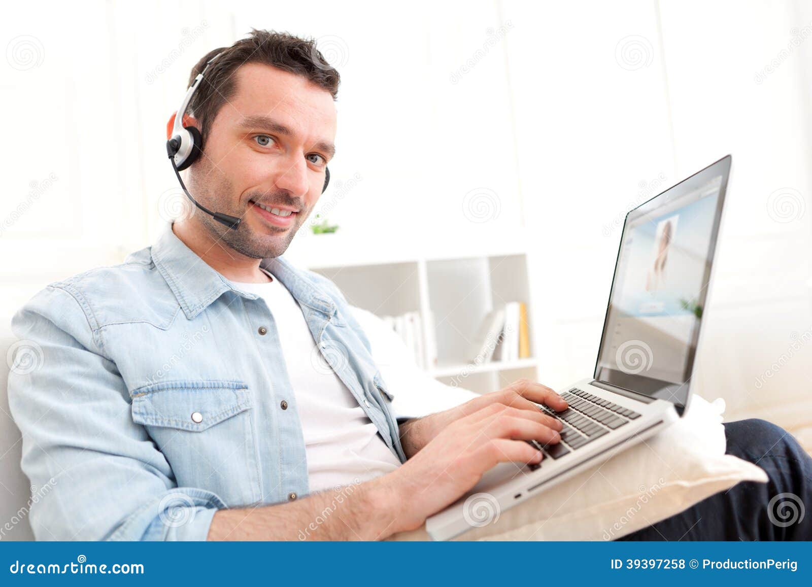 Young Relaxed Man Video-calling on Internet Stock Photo - Image of ...