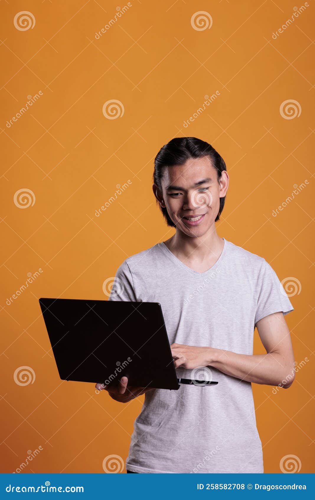 Young Remote Worker Working on Laptop Stock Photo - Image of home ...