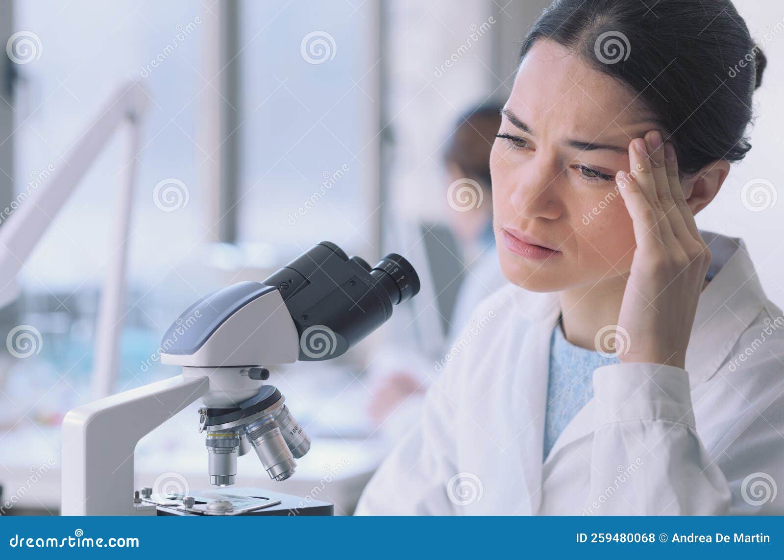 Young Researcher Having a Headache Stock Photo - Image of examining ...