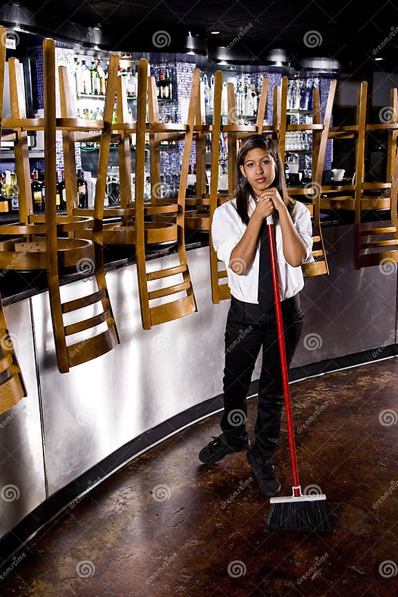 Young Restaurant Worker Cleaning Up Stock Photo - Image of counter ...