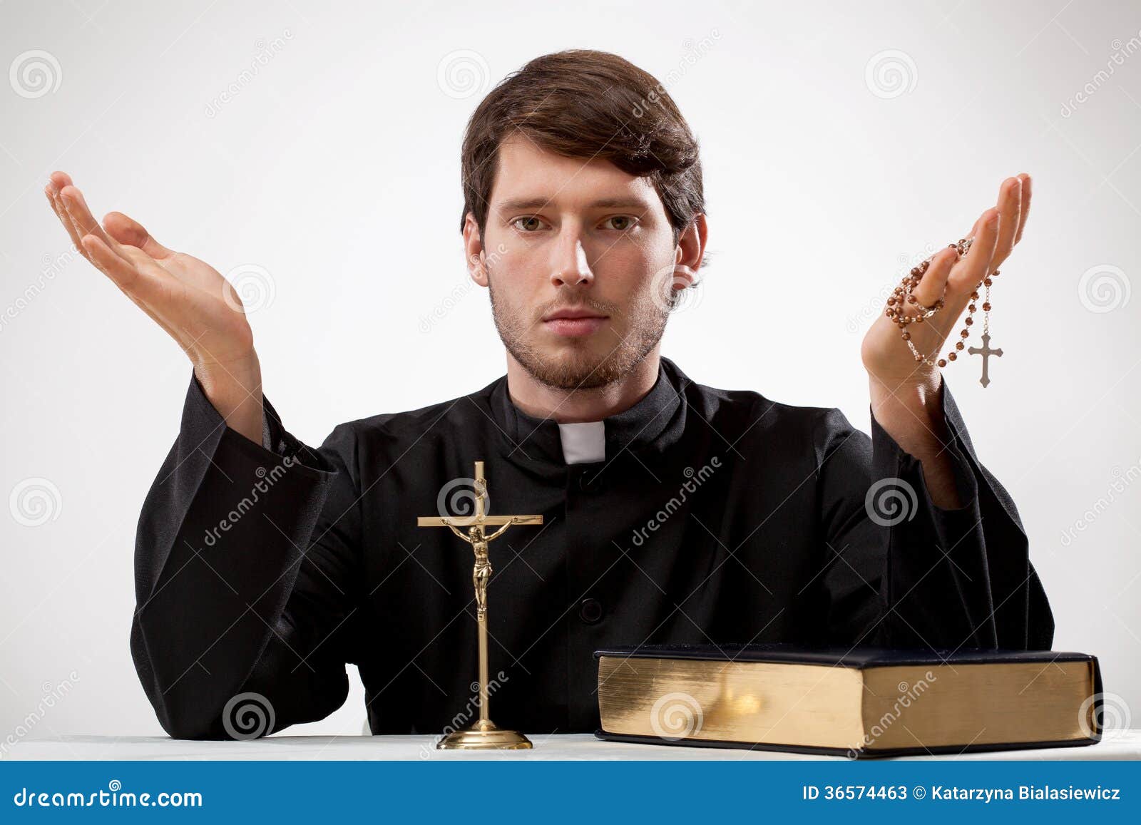 Young Reverend with Rosary and the Bible Stock Image - Image of ...