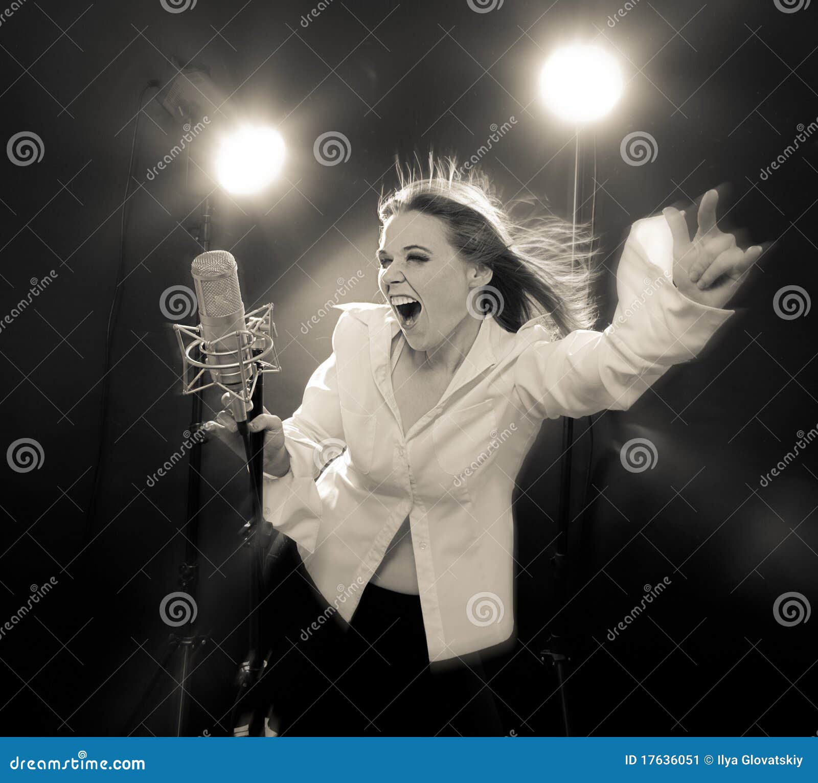 Young Rock and Roll Singer with Microphone Stock Image - Image of music ...