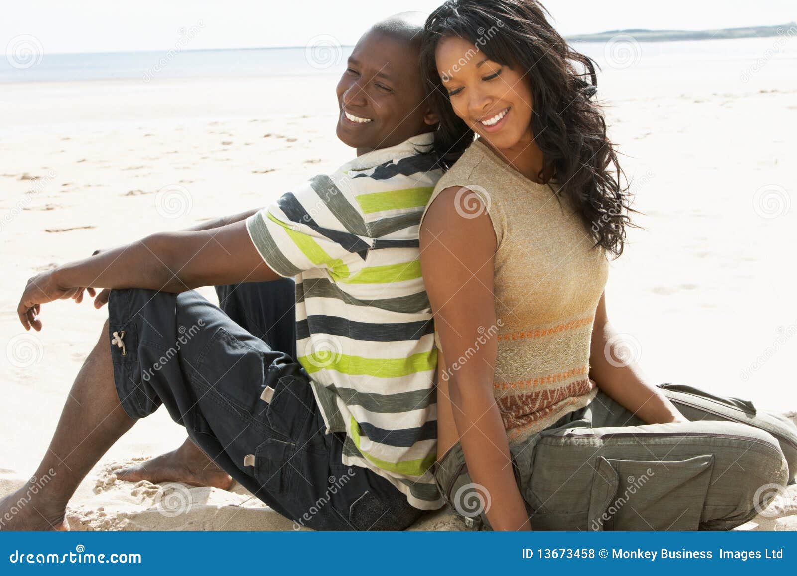 Young Romantic Couple Relaxing on Beach Together Stock Photo - Image of ...