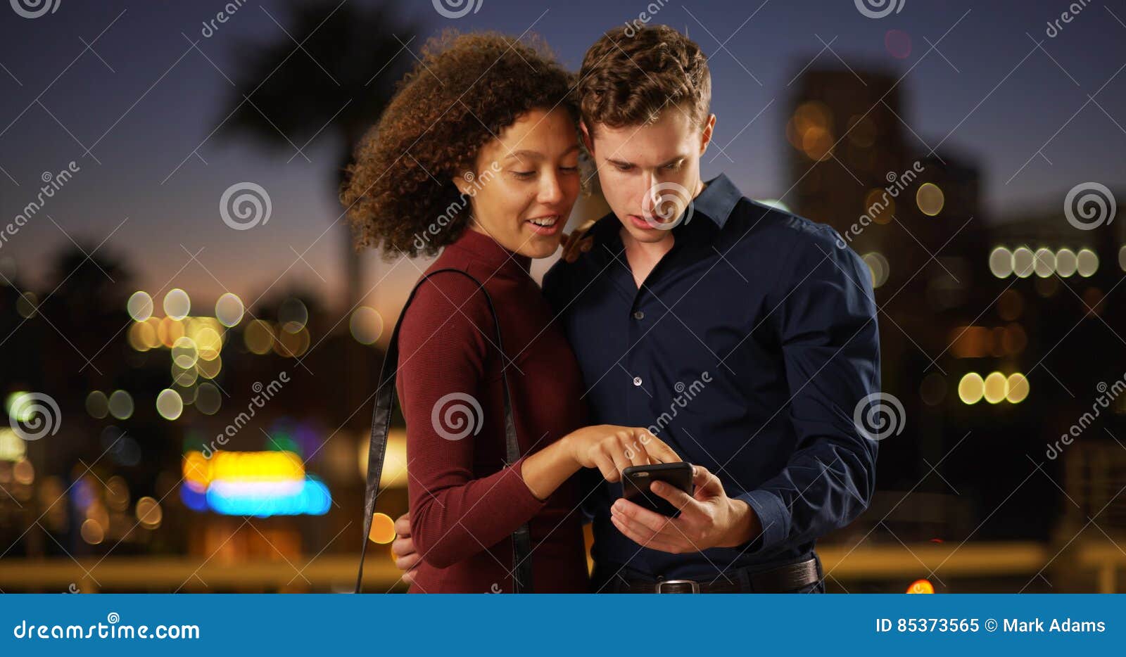 Young Romantic Couple Using Smartphone Gps for Directions Stock Image ...