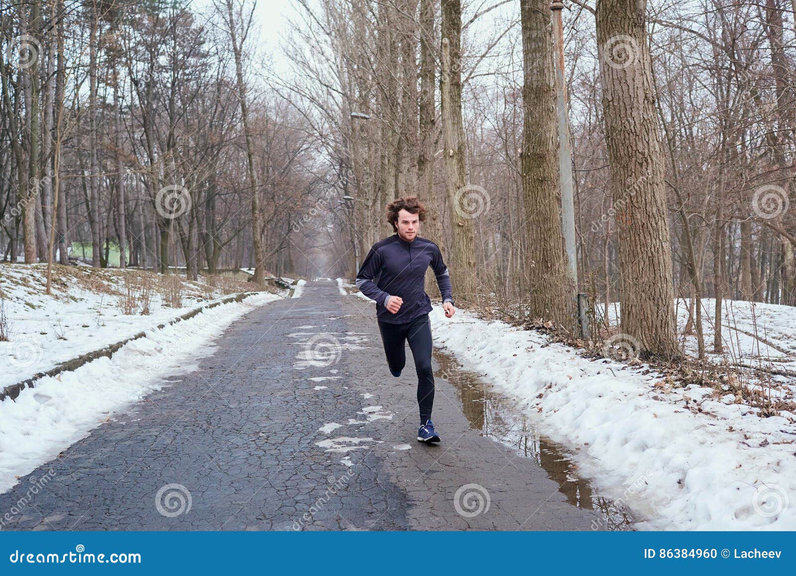 Young Runner Running in the Park in Spring, Autumn on Nature Stock ...