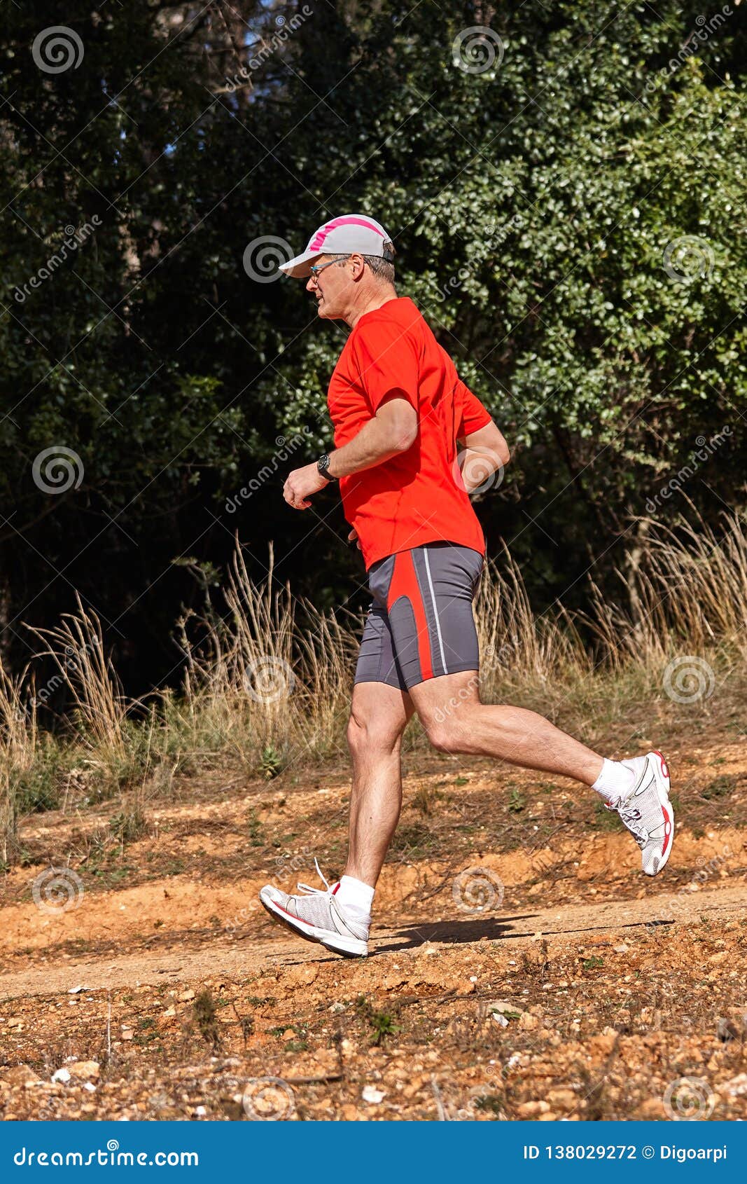 Young Runner Running in Red T-shirt at Springtime Stock Photo - Image ...