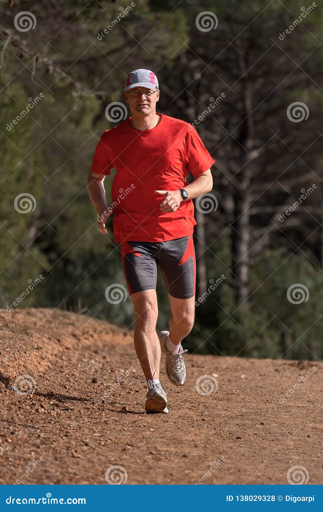 Young Runner Running in Red T-shirt at Springtime Stock Photo - Image ...