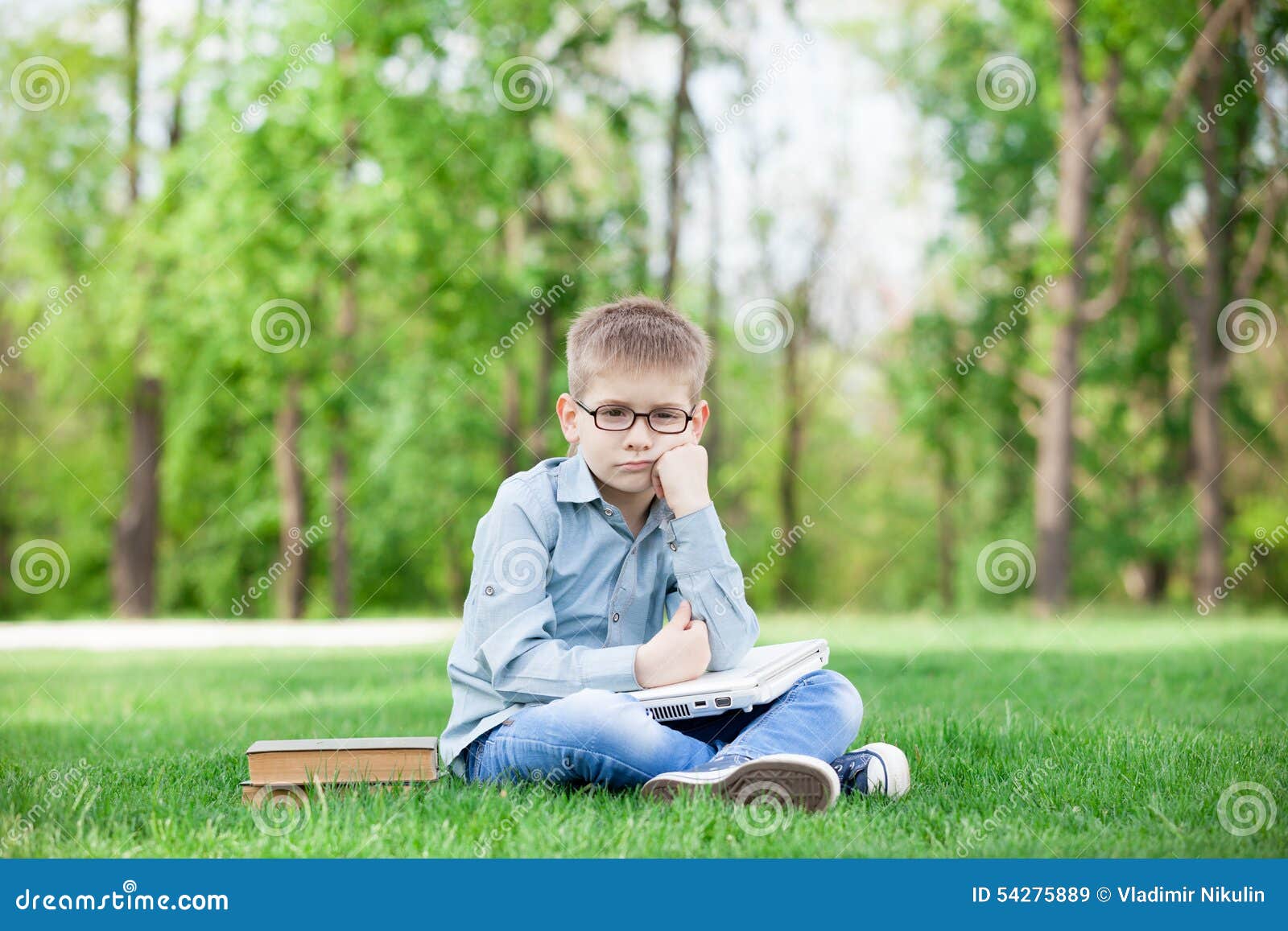 Young Sad Boy with a Books and Laptop Stock Image - Image of casual ...