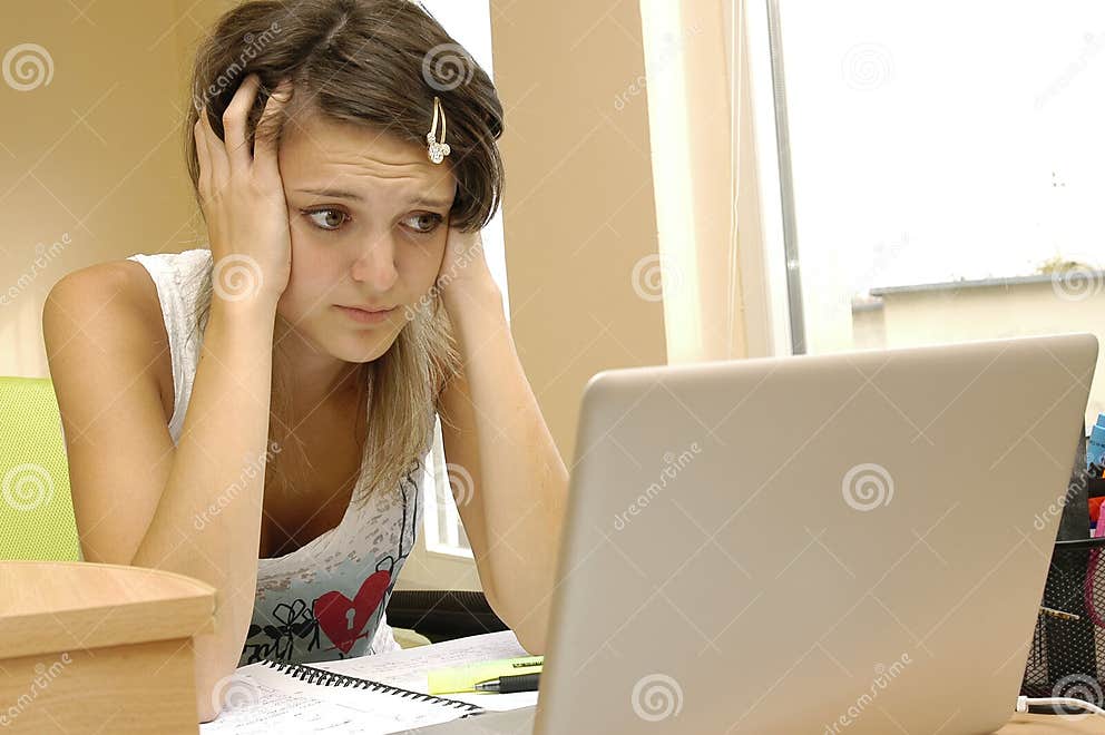 Young Sad Girl with Computer Stock Photo - Image of mood, unhappy: 11016560