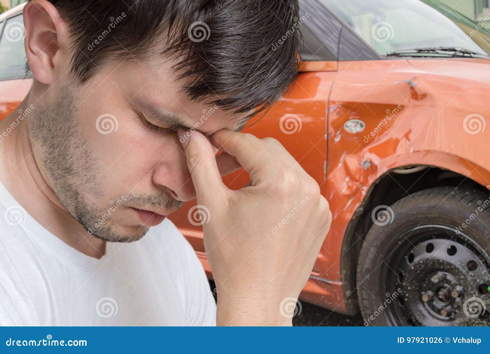 Young Sad Man Had Car Accident. Damaged Car in Background Stock Photo ...