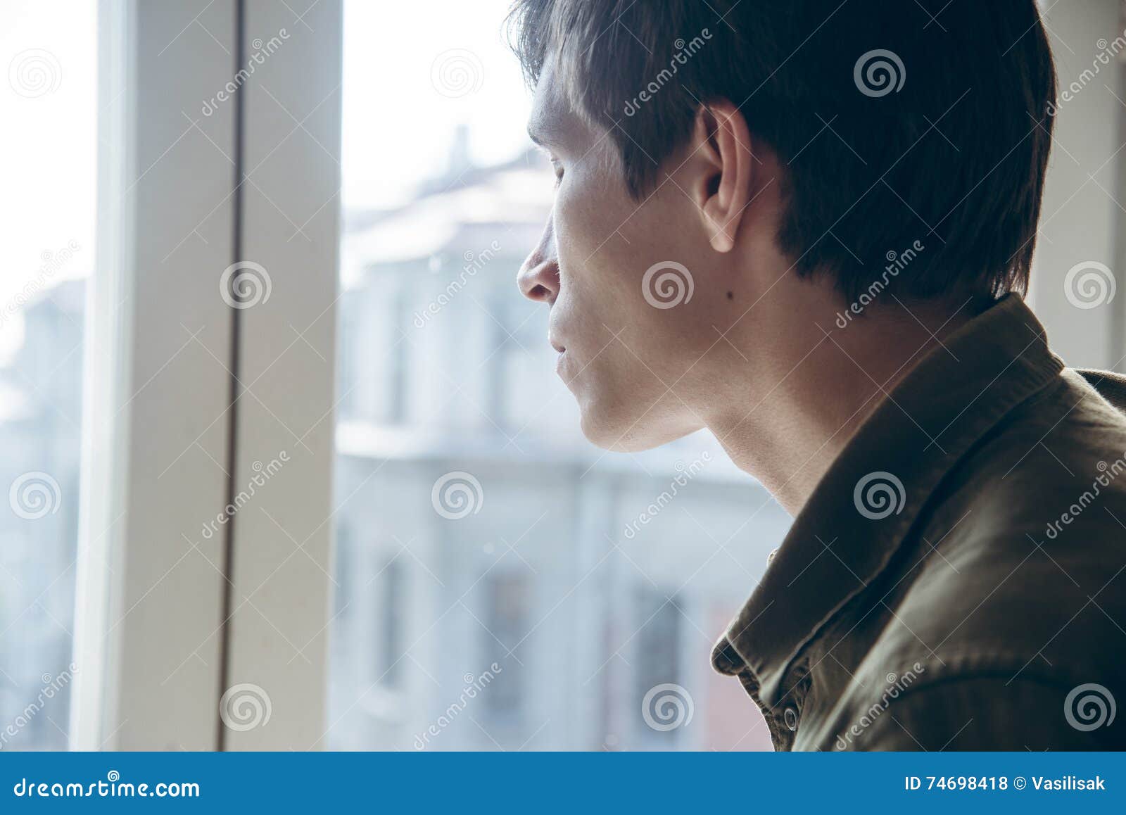 Young Sad Man Looking Out the Window Stock Photo - Image of people ...