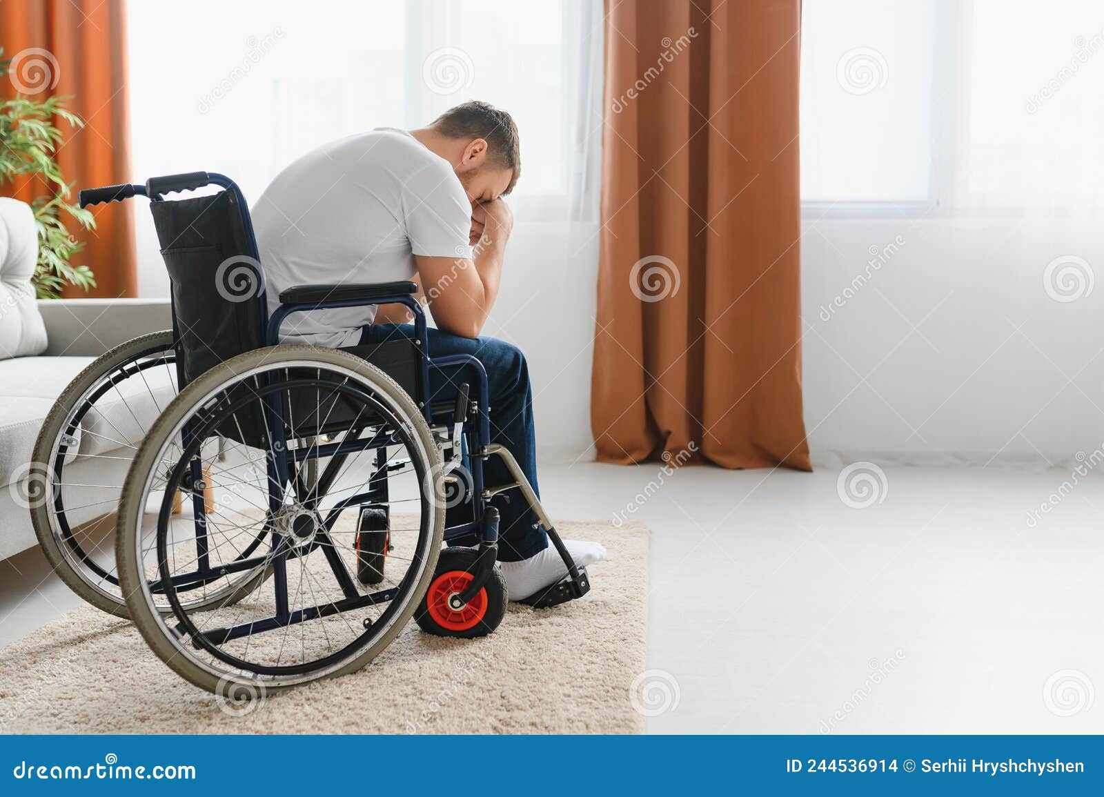 Young Sad Man in a Wheelchair at Home. Stock Photo - Image of portrait ...