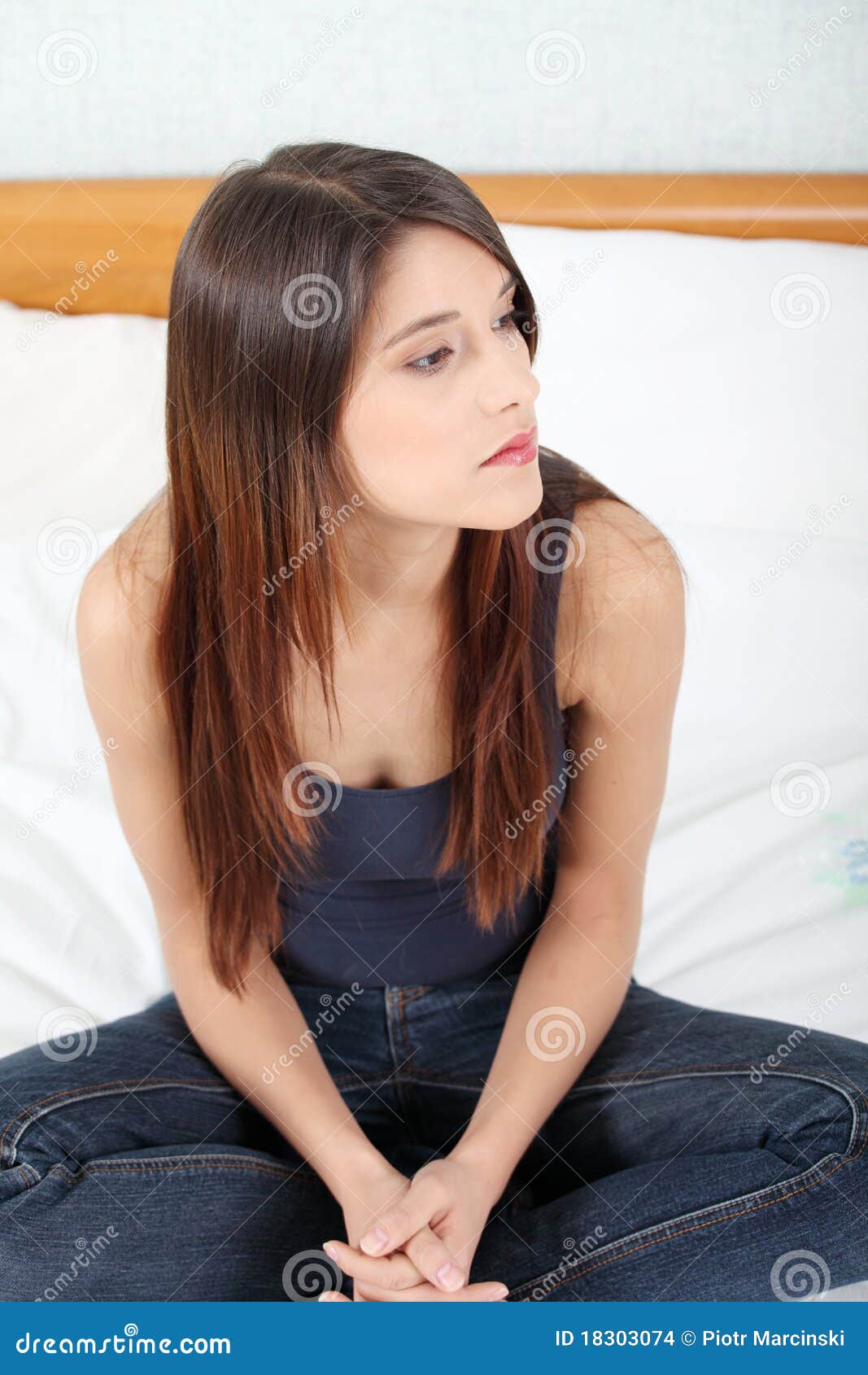 Young Sad Woman Sitting on Bed Stock Photo - Image of lovely, interior ...