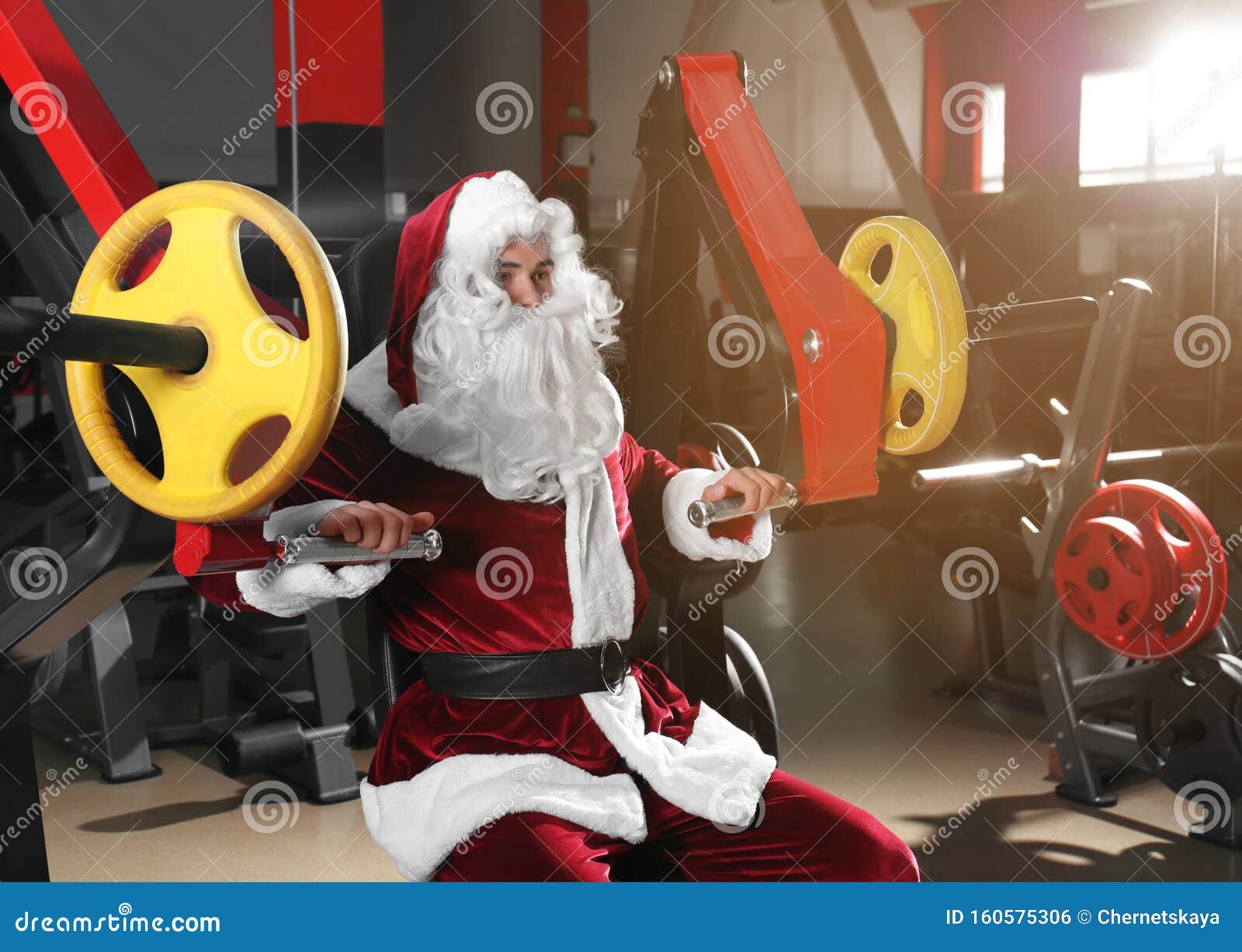 Young Santa Claus Training in Gym Stock Photo - Image of person ...
