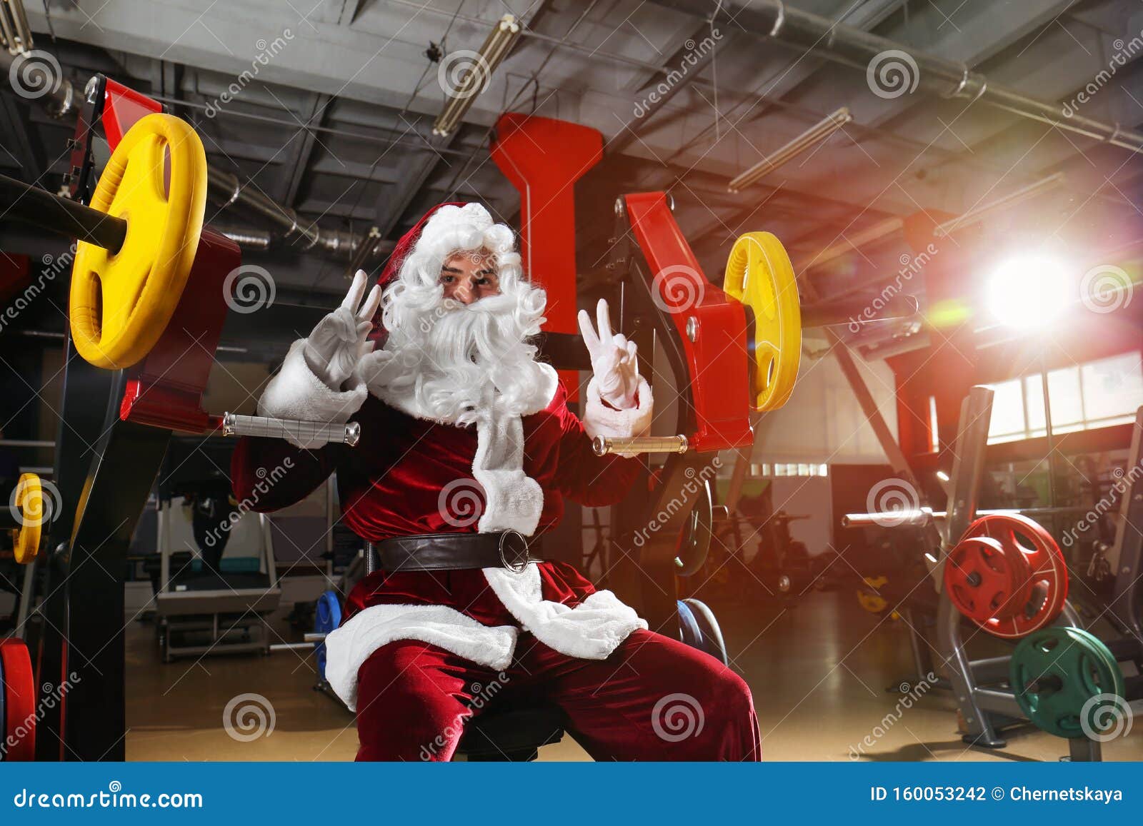 Young Santa Claus Training in Gym Stock Photo - Image of indoors ...