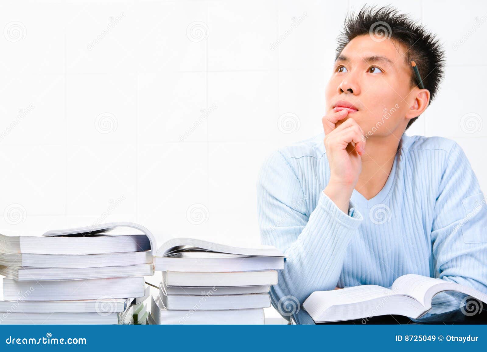 Young Scholar Looking for Idea Stock Image - Image of reading, pile ...