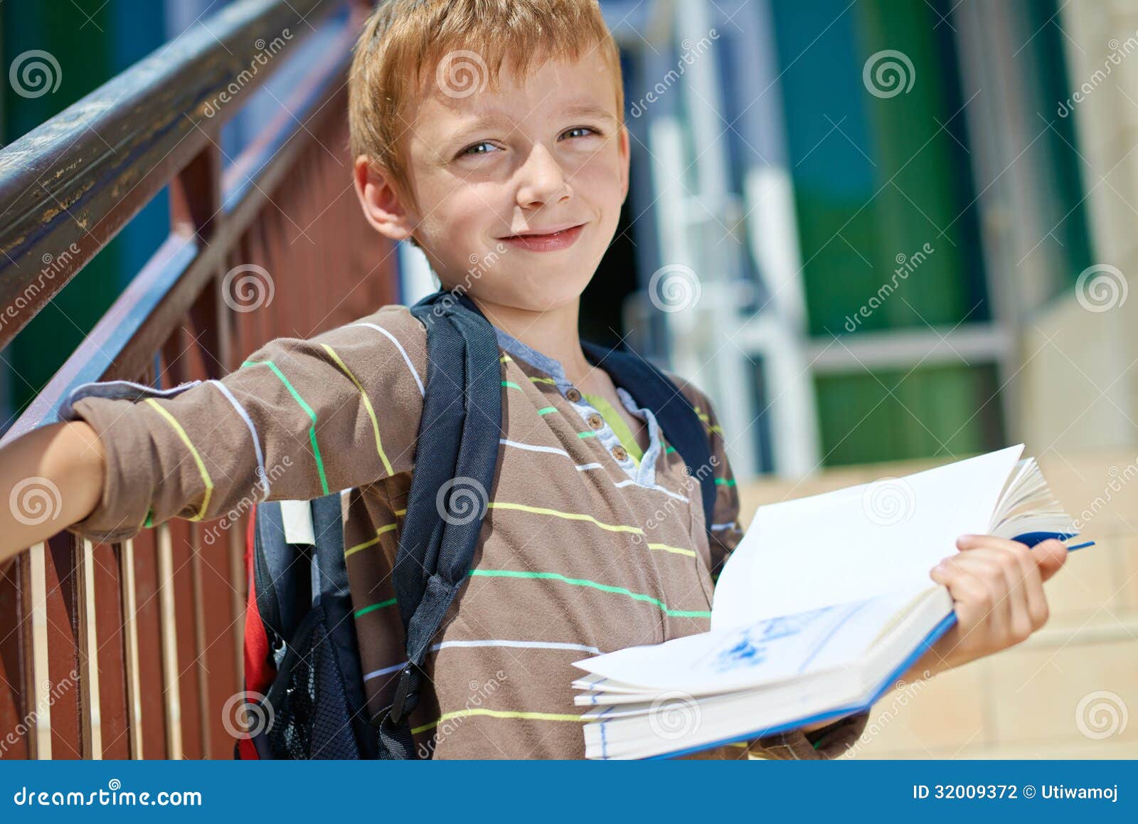 Young schoolboy with book stock photo. Image of exploring - 32009372