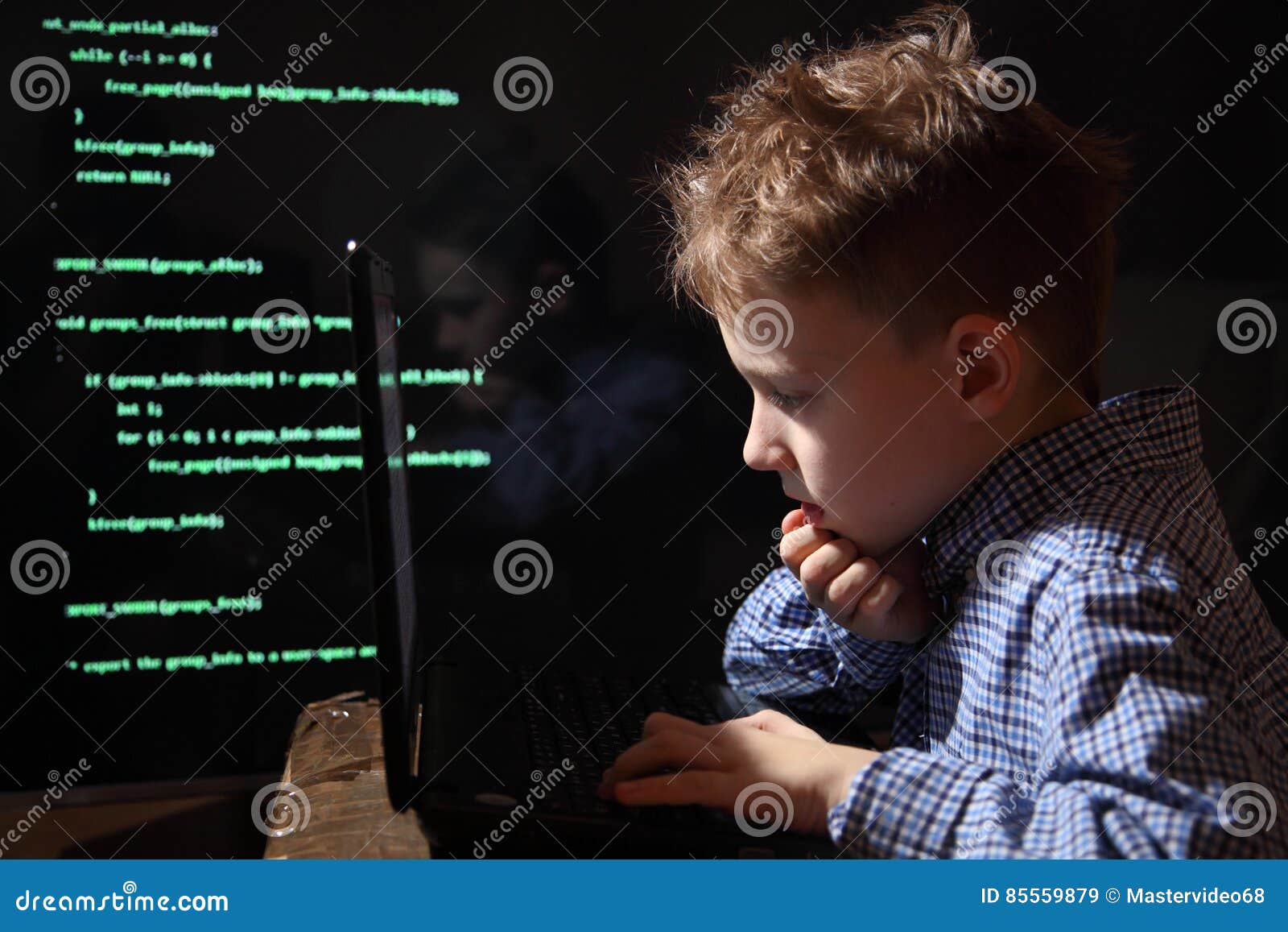 Young Schoolboy Prodigy - a Hacker. Hacker at Work. Stock Image - Image ...