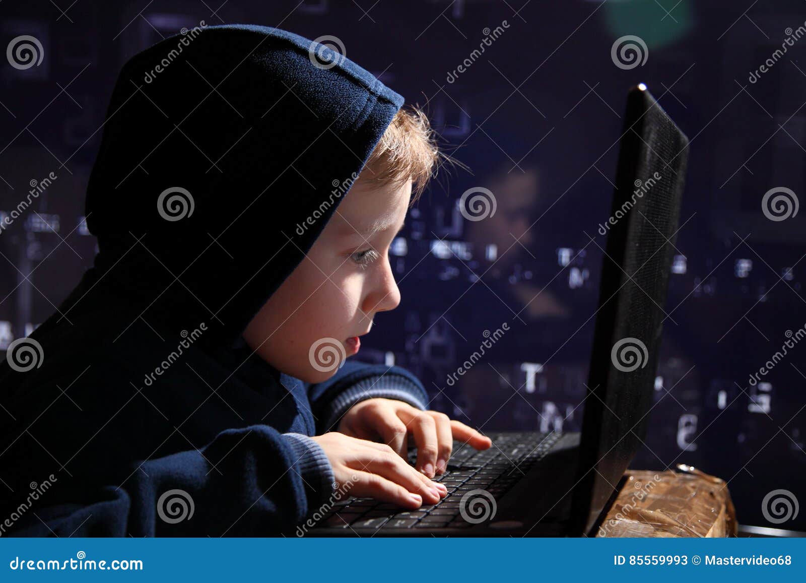 Young Schoolboy Prodigy - a Hacker. Hacker at Work. Stock Image - Image ...