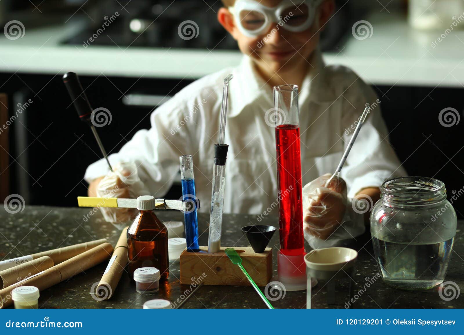 Young Scientist Chemist Grinning while Making His Scientific ...