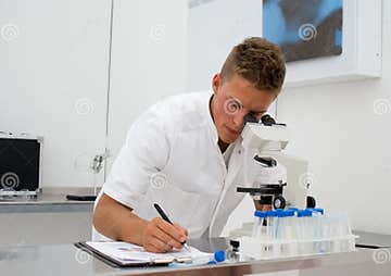 Young Scientist Collecting Data Stock Image - Image of medical, coat ...